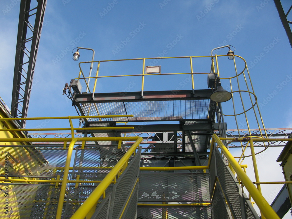 dangerous workplace in height, steel working platforms, traverses ...