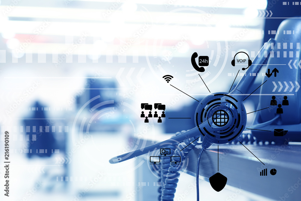 close up soft focus on headset with telephone devices at office desk ...