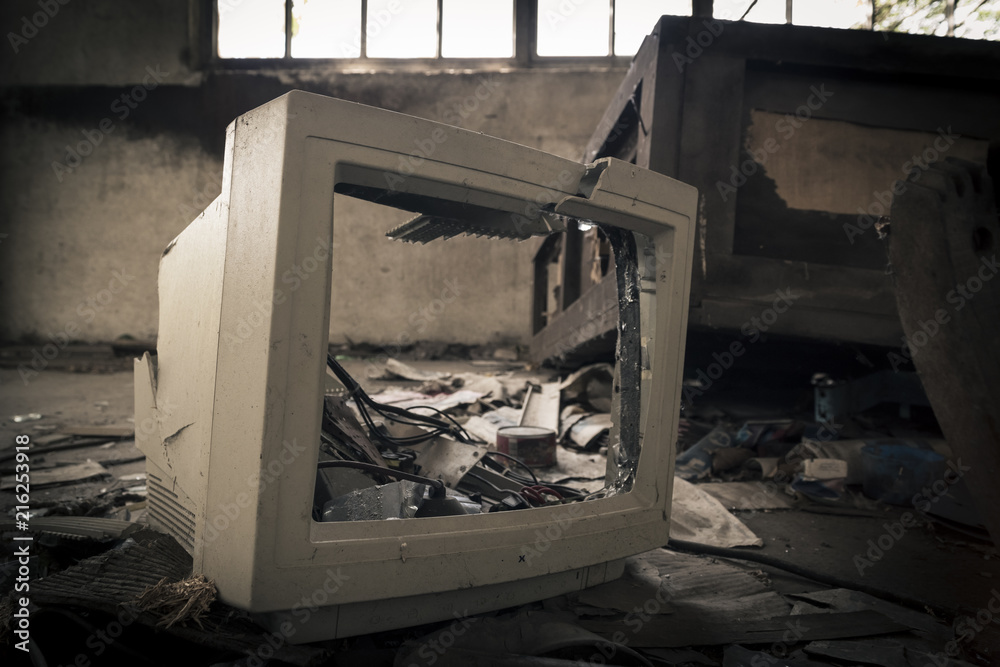 Broken computer monitor in abandoned factory. Stock Photo | Adobe Stock