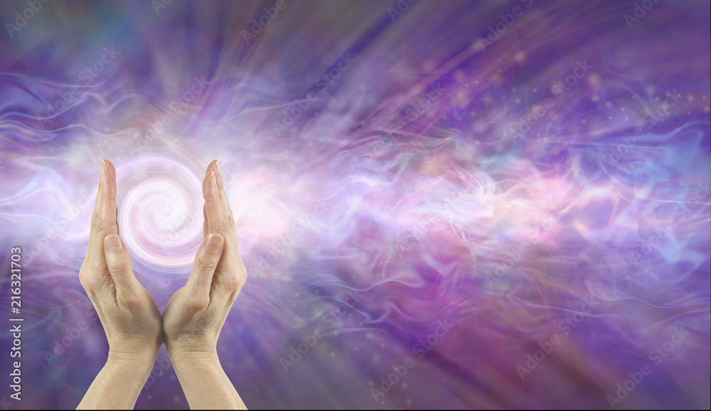 Channeling Vortex healing energy - female hands facing upwards with a ...