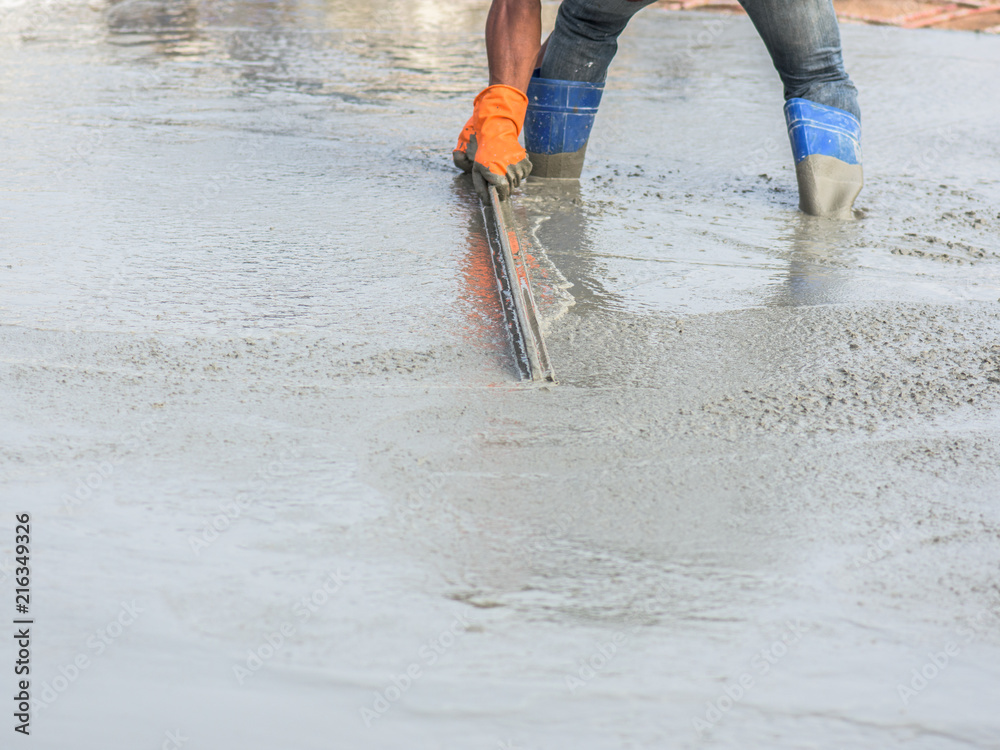 People plastering cement skimming the concrete surface from Pouring ...