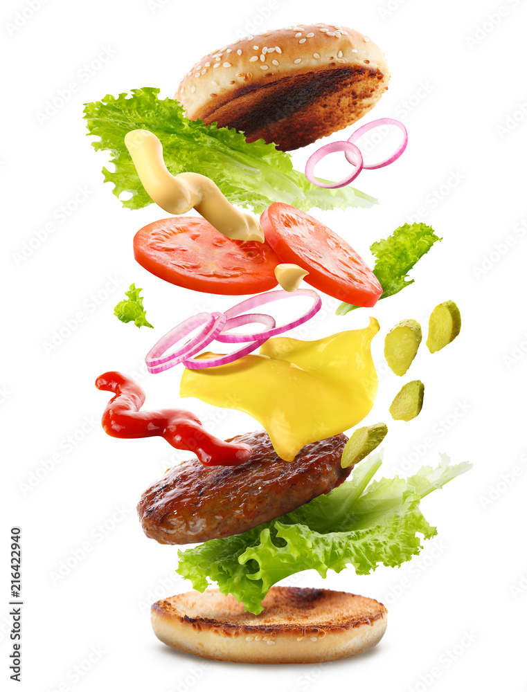 Delicious burger with floating ingredients, isolated on white ...