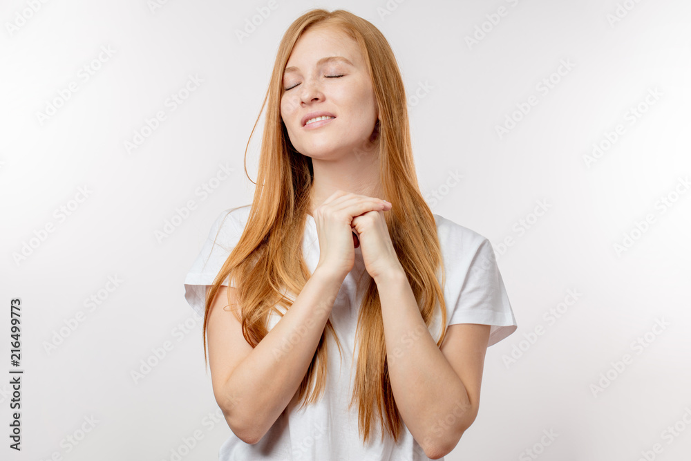 pretty girl with happy expression. Ginger nice woman is waiting for ...