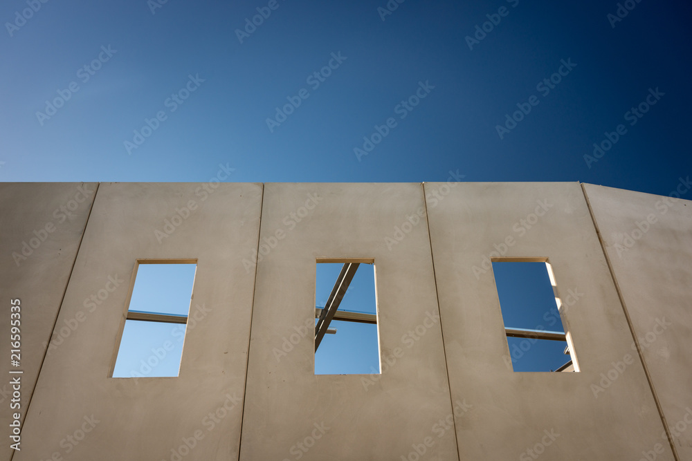 Foto de Prefabricated concrete walls with windows, being erected ...