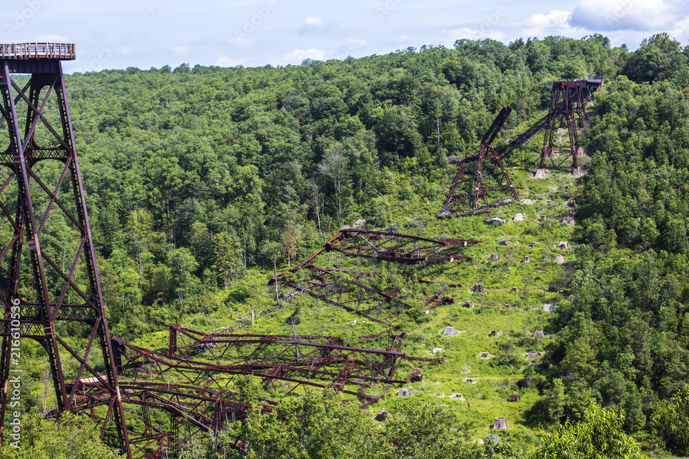 Fallen iron railroad bridge after tornado hit, at the Kinzua bridge ...