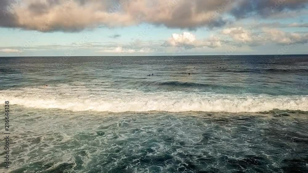 surf spot with men surfers and waves from ocean power. vacation scenic ...