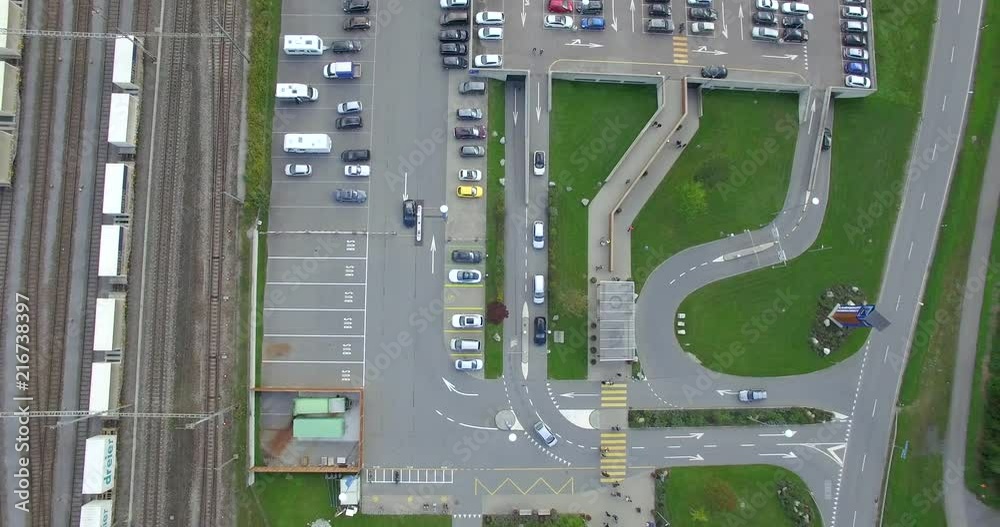4k aerial top drone shot of flyover road junction near parking lot ...