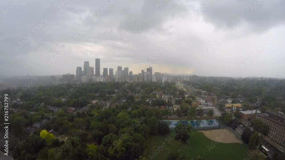 Rain storm clouds moving into midtown Toronto time lapse, pouring rain ...