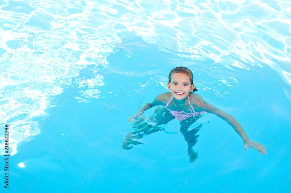 Cute smiling happy little girl child in swimming pool Stock Photo ...