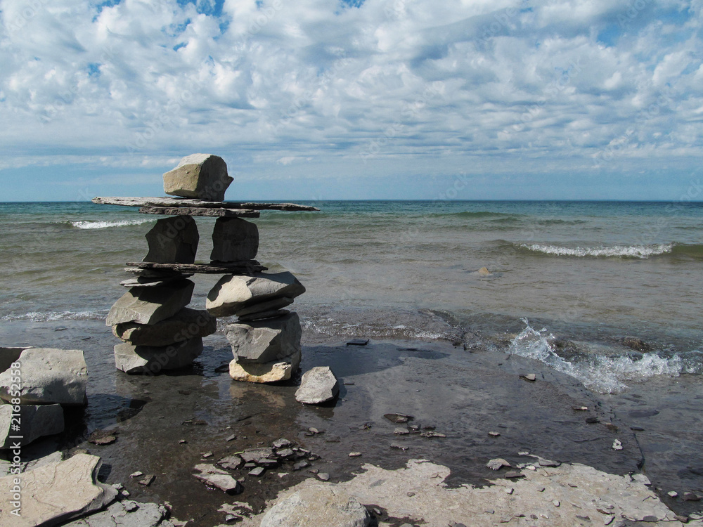 Inukshuk native rock symbol in Canada Nova Scotia at peggy's cove on ...