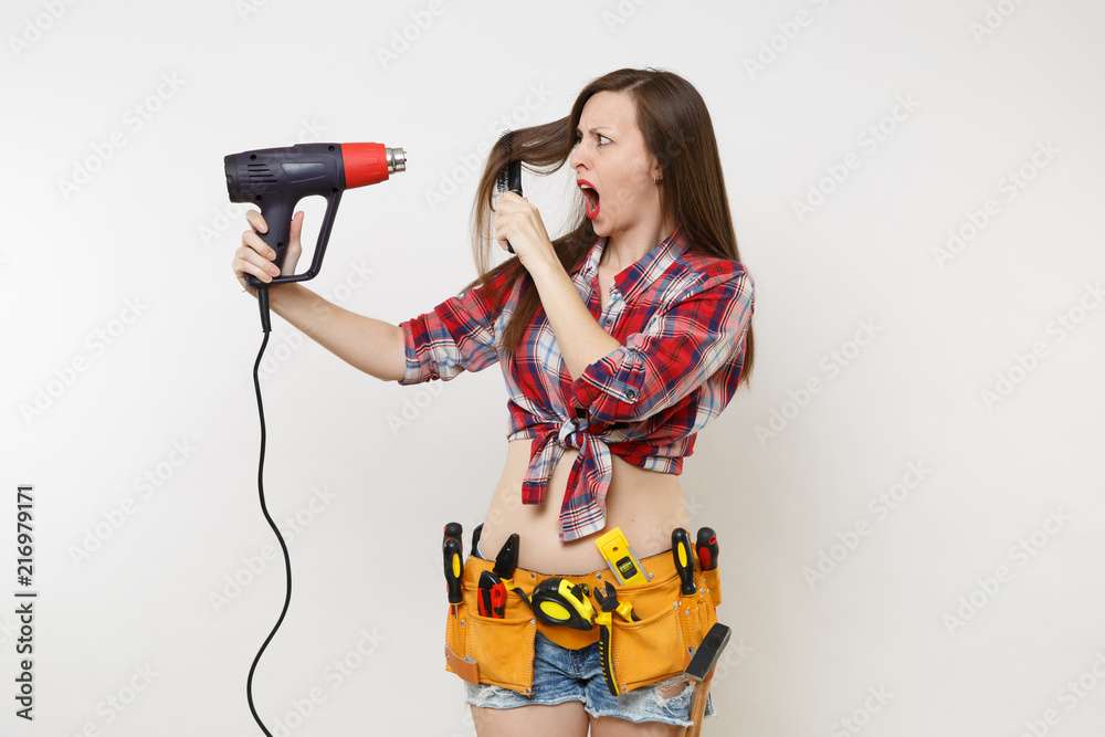 Silly mad strange fun handyman woman in plaid shirt, denim shorts, kit ...