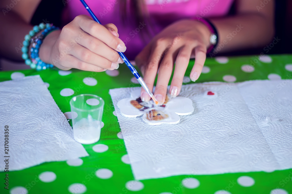 Children hands making artworks with wood and paint crafts. workplace ...