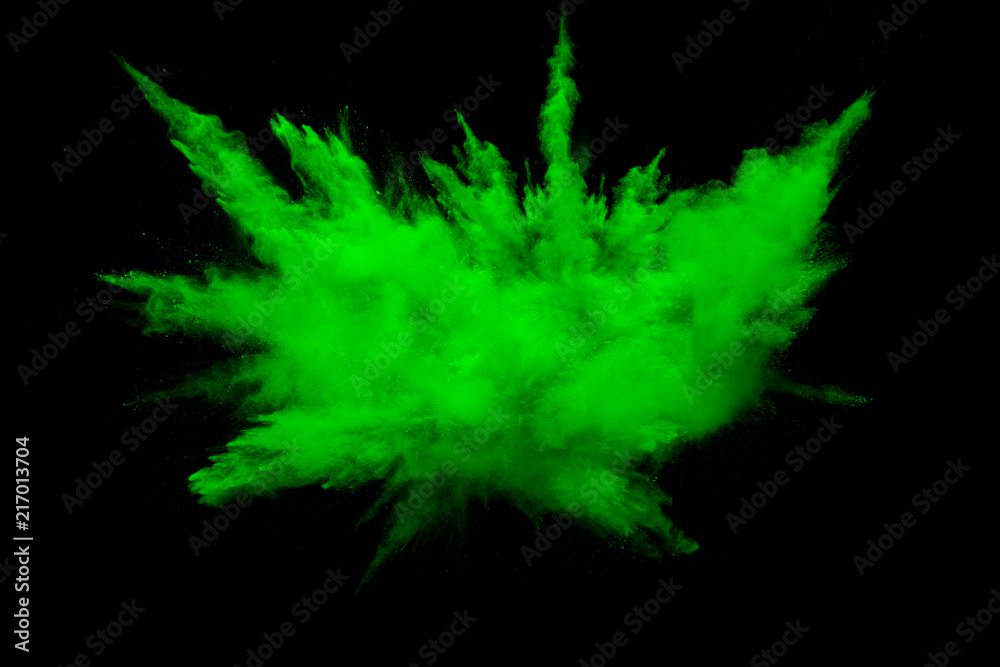 Green powder explosion on black background. Stock Photo | Adobe Stock