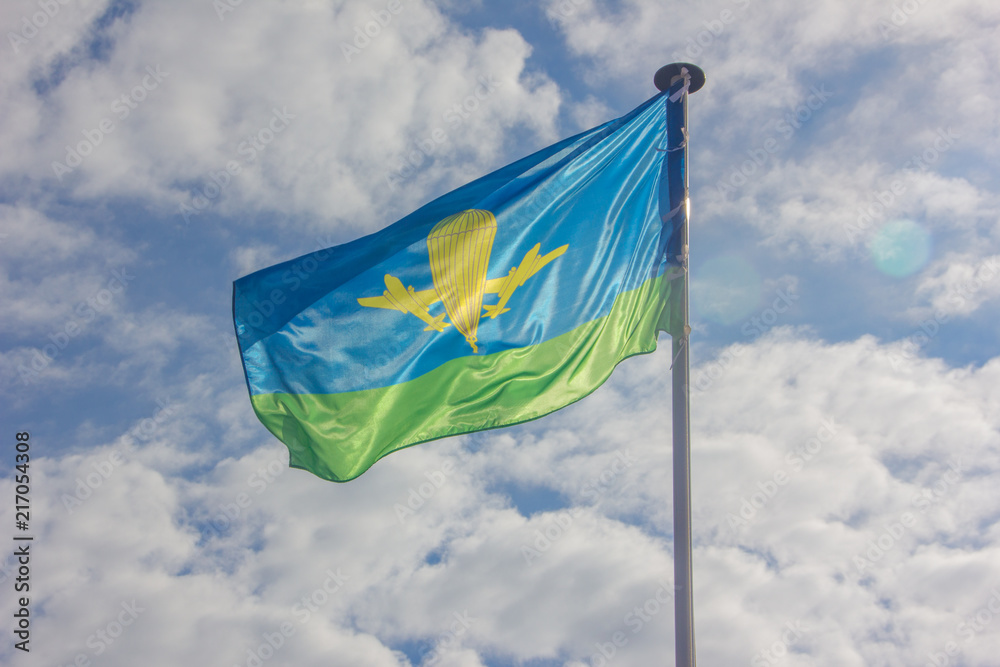 The Flag of the Airborne Forces is developing against the sky. Flag of ...