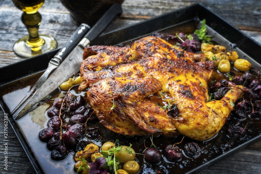 Modern spatchcocked barbecue chicken al mattone chili with red and ...