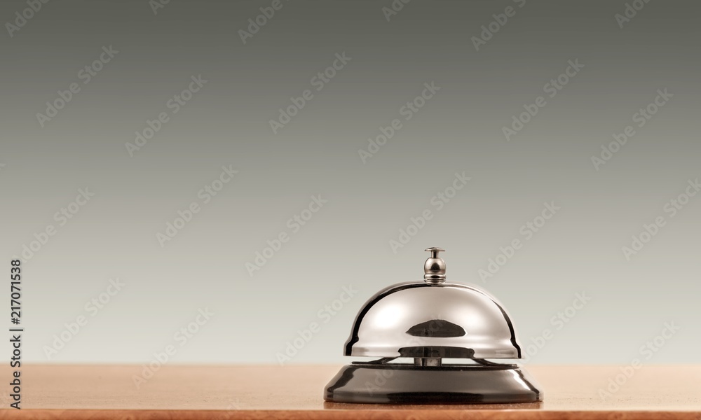Vintage hotel reception service desk bell. Stock Photo | Adobe Stock