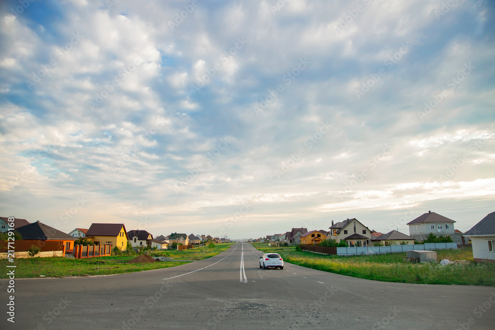 Sidewalk and street.New English Property.Asphalt road in a beautiful ...