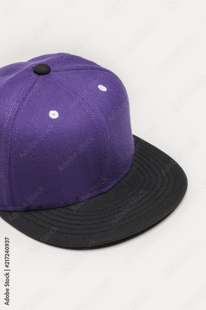 purple cap isolated white. Stock Photo | Adobe Stock