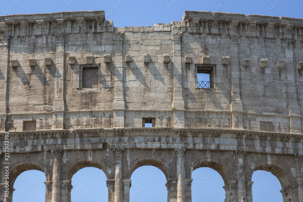 Detail of the Colosseum, known as Amphitheatrum Flavium, symbol of the ...