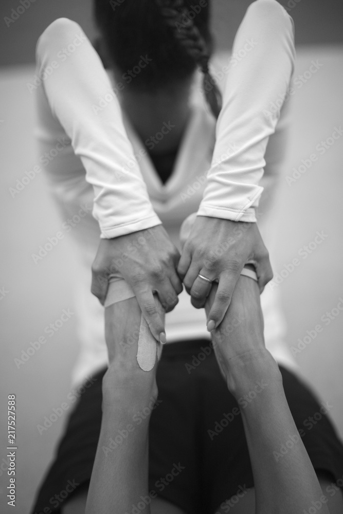 Exercise for stretching the muscles of the back with hands closed and ...