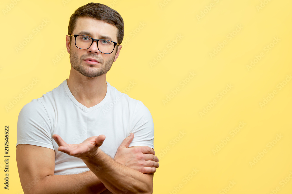 what do you want young handsome man asking a question. ask help, advise ...