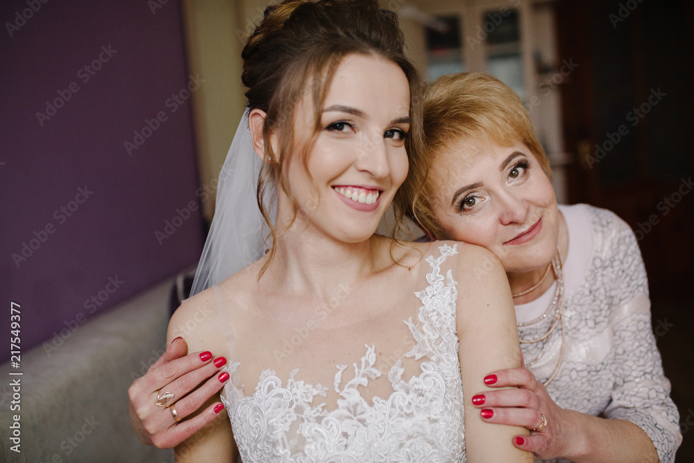 Mother of the bride blesses the bride for a happy family life. Stock ...