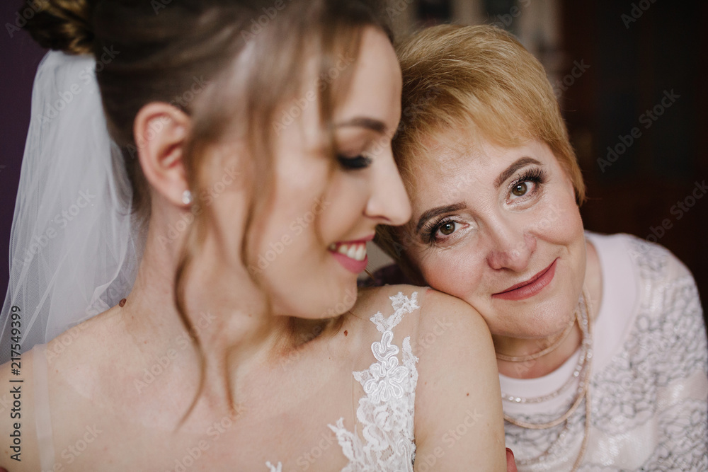 Mother of the bride blesses the bride for a happy family life. Stock ...