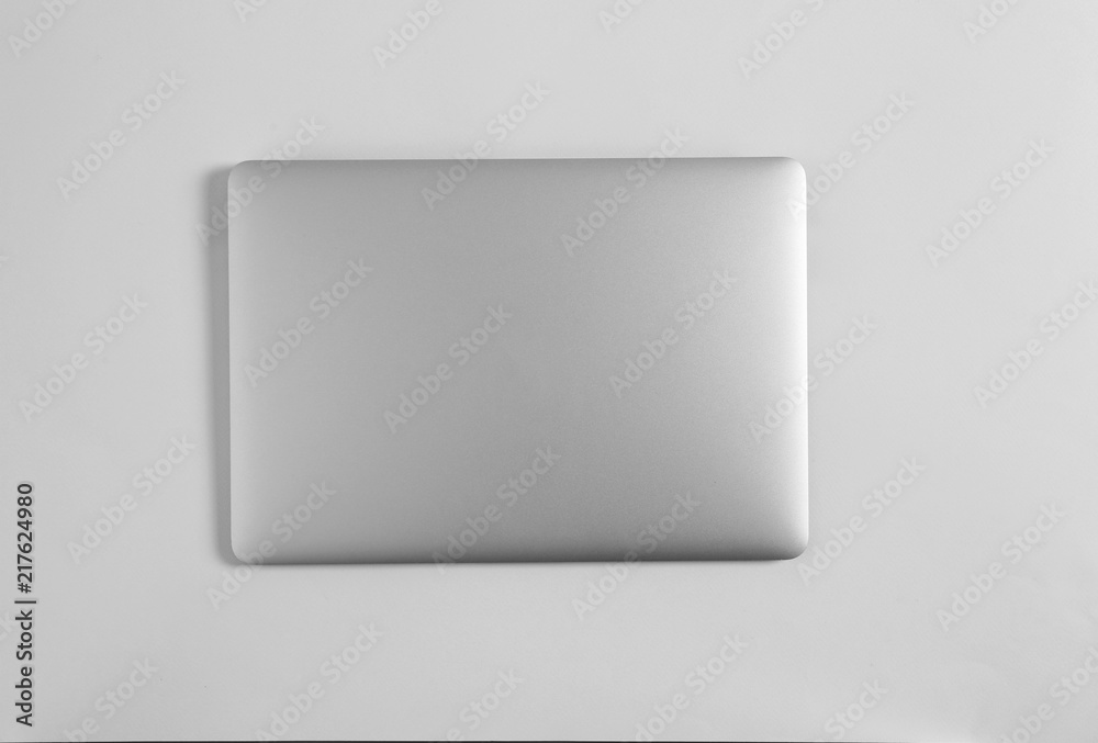 Modern laptop on light background, top view Stock Photo | Adobe Stock