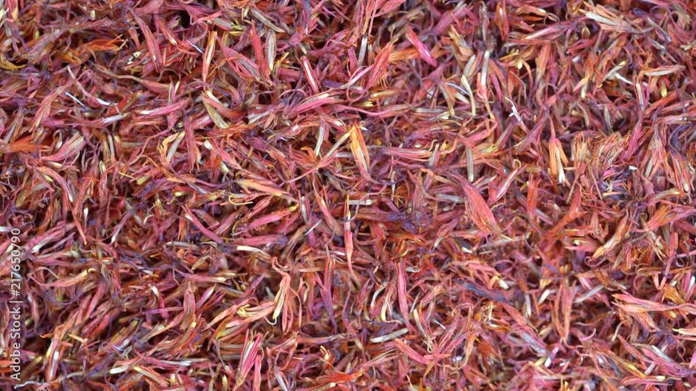 Saffron threads close up rotation loopable 4k top view. Food background ...