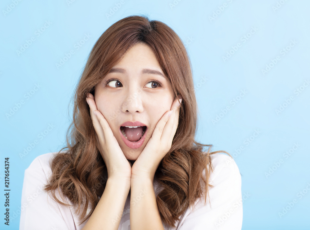 closeup Surprised young woman face Stock Photo | Adobe Stock