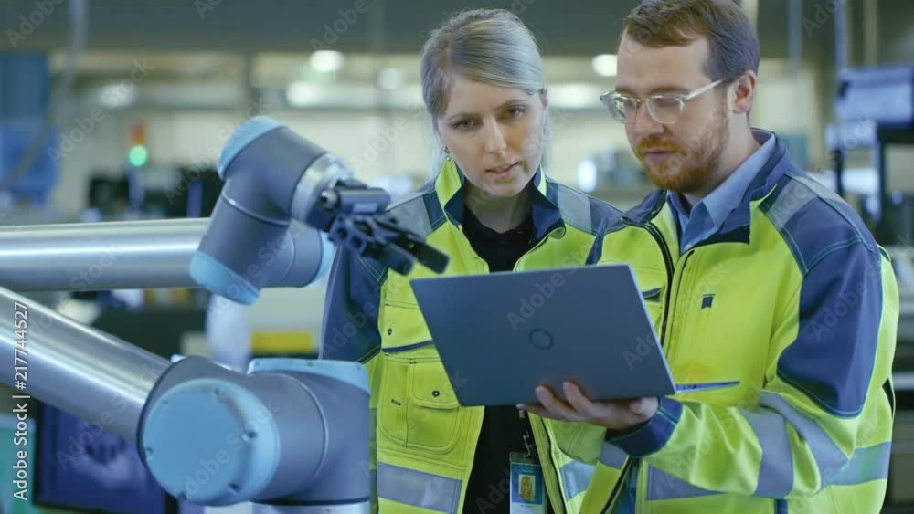 At the Factory: Female Chief Production Engineer and Male Automation ... At the Factory: Female Chief Production Engineer and Male Automation ...