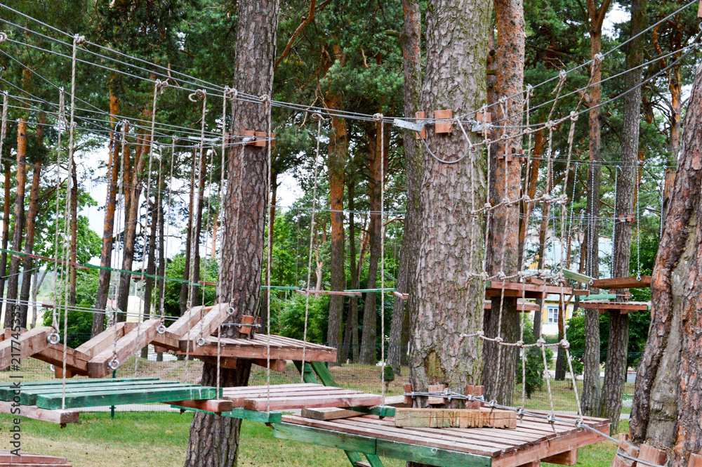 A climbing wall, trolls and a rope park are sporting for games and ...