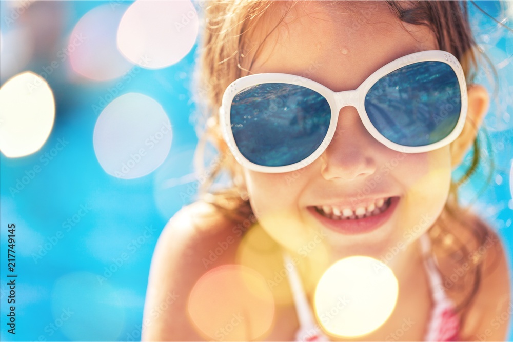 Beautiful girls at swimming pool in summer Stock Photo | Adobe Stock