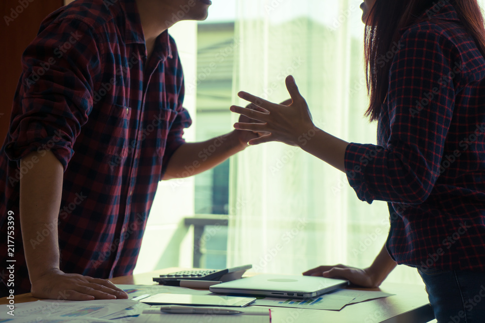 Co worker is argueing with friend over office table Stock Photo | Adobe ...
