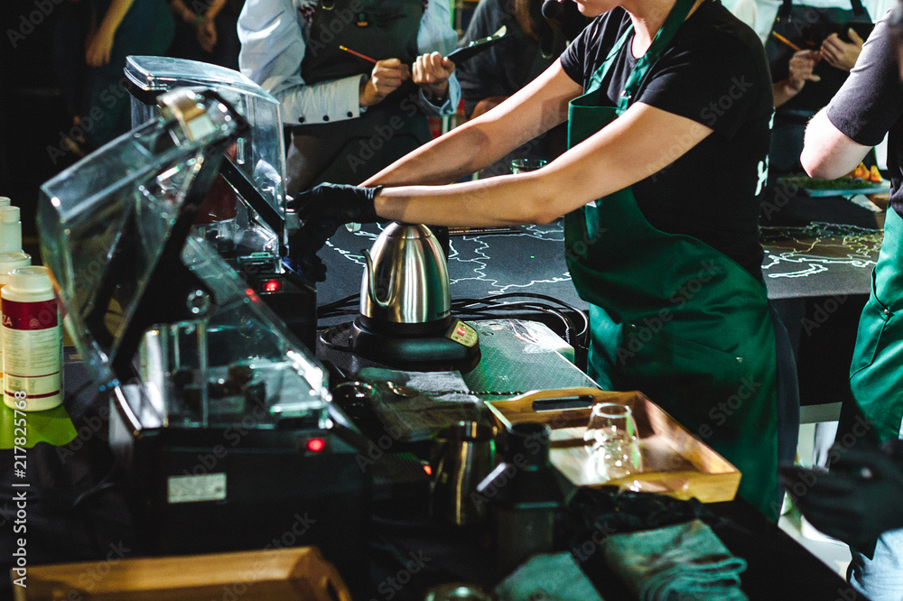 championship among coffee houses, members of teams show barista's skill ...
