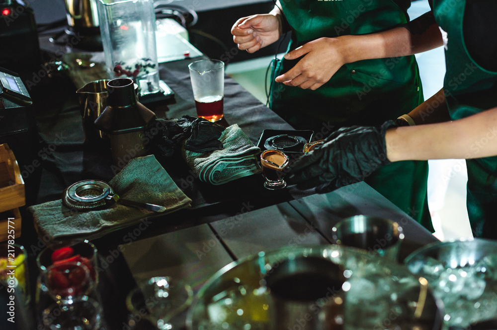 championship among coffee houses, members of teams show barista's skill ...