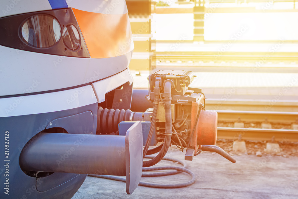 modern high-speed train at the station. Part of the train, coupler ...