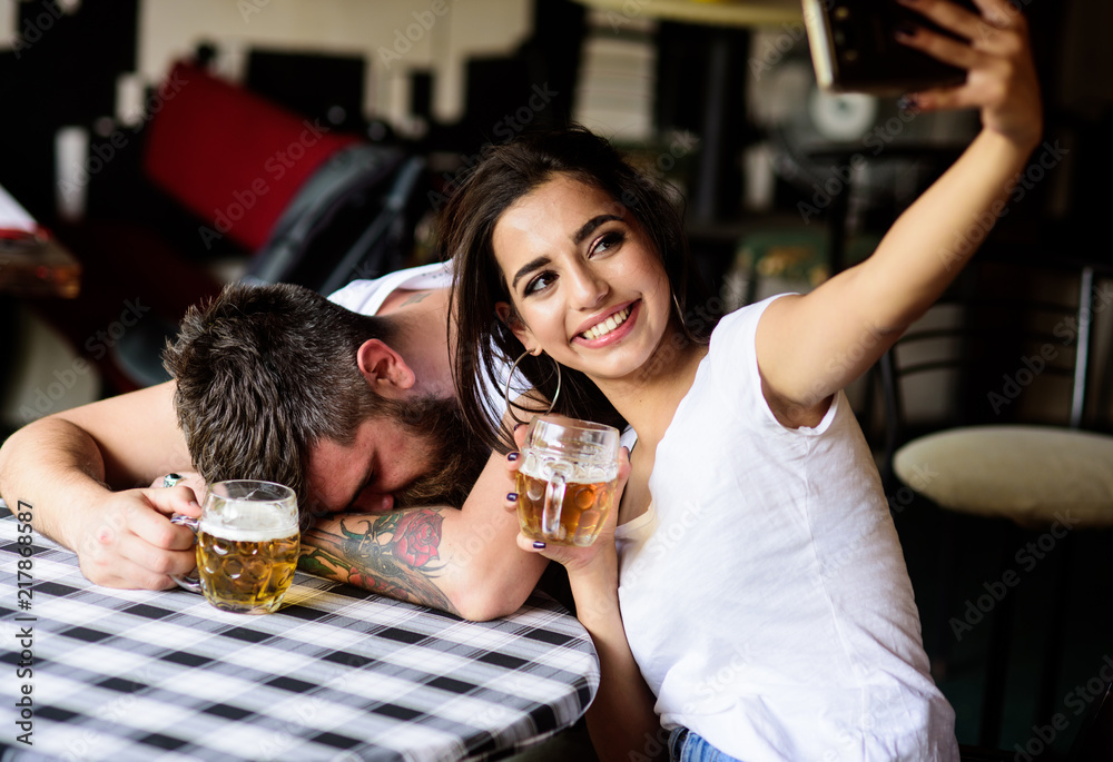 Girl taking selfie photo drunk boyfriend. Take selfie to remember great ...