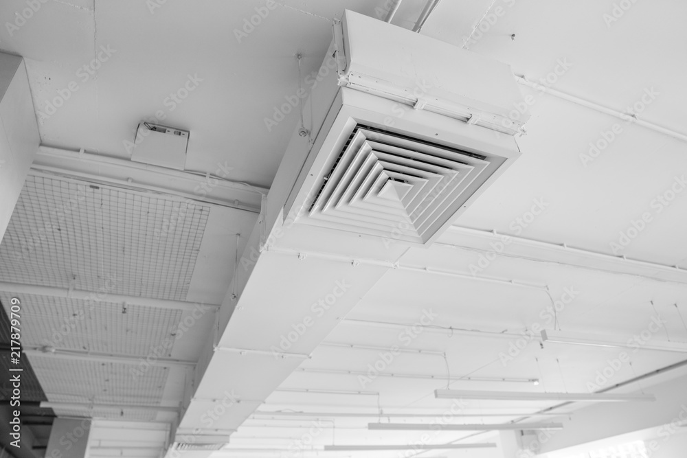 Ventilation system on the ceiling of large buildings. Ventilation pipes ...