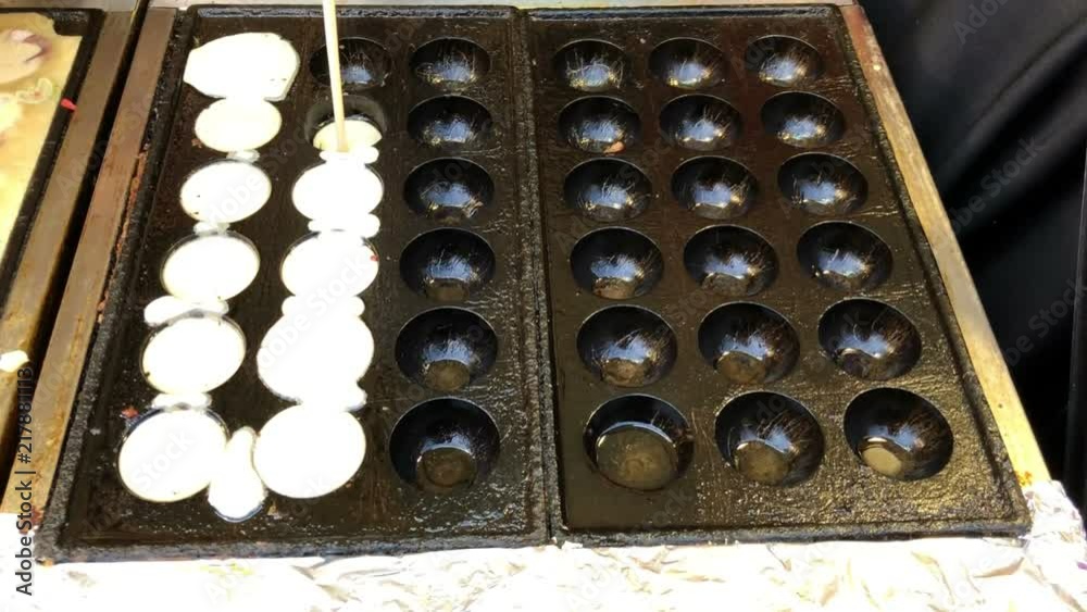 Cooking ball-shaped on street food dumpling fried snack dish with big ...