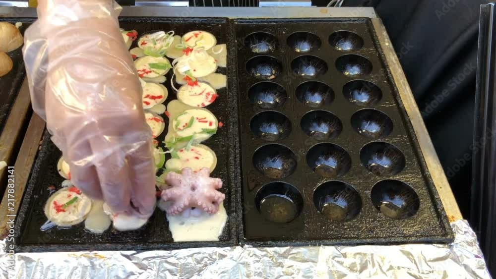 Cooking ball-shaped on street food dumpling fried snack dish with big ...