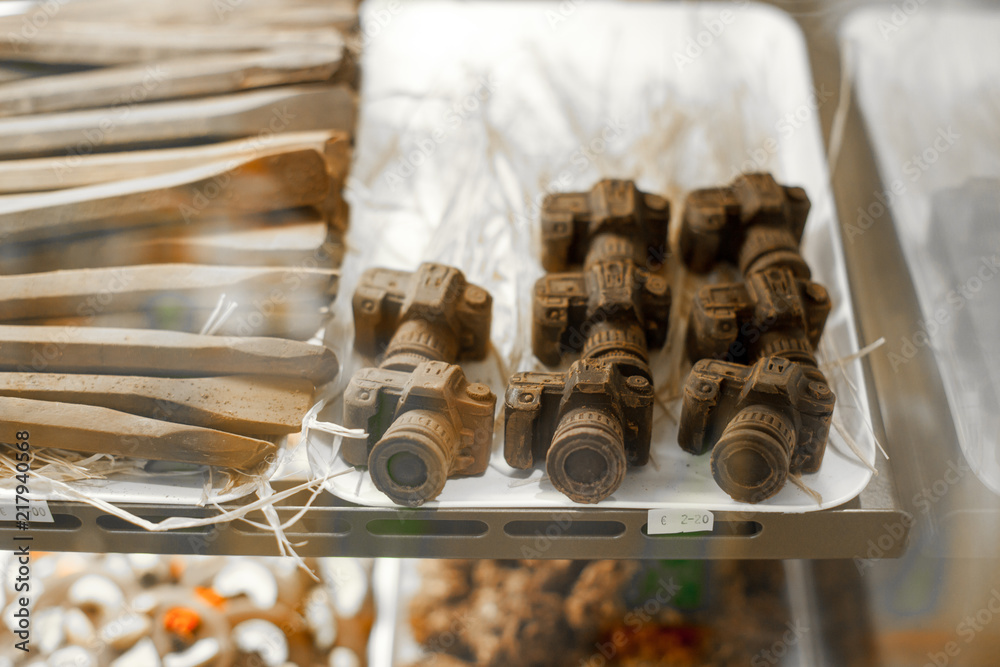 Camera-shaped chocolate bar candy sweet. Assorted chocolate candy shop ...