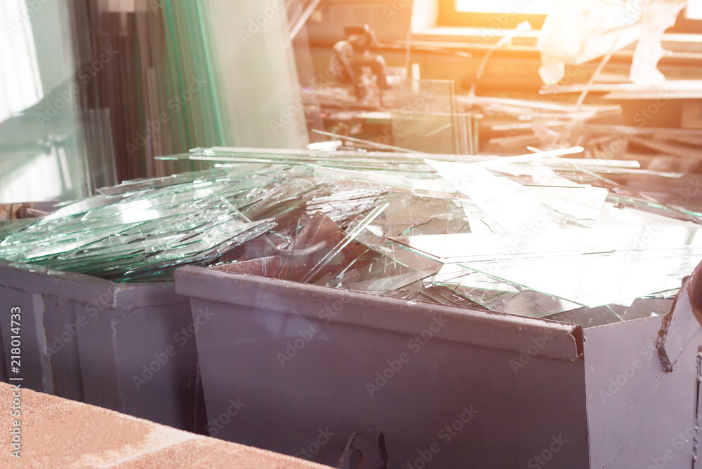 Large container with broken broken glass, manufacturing waste glass ...