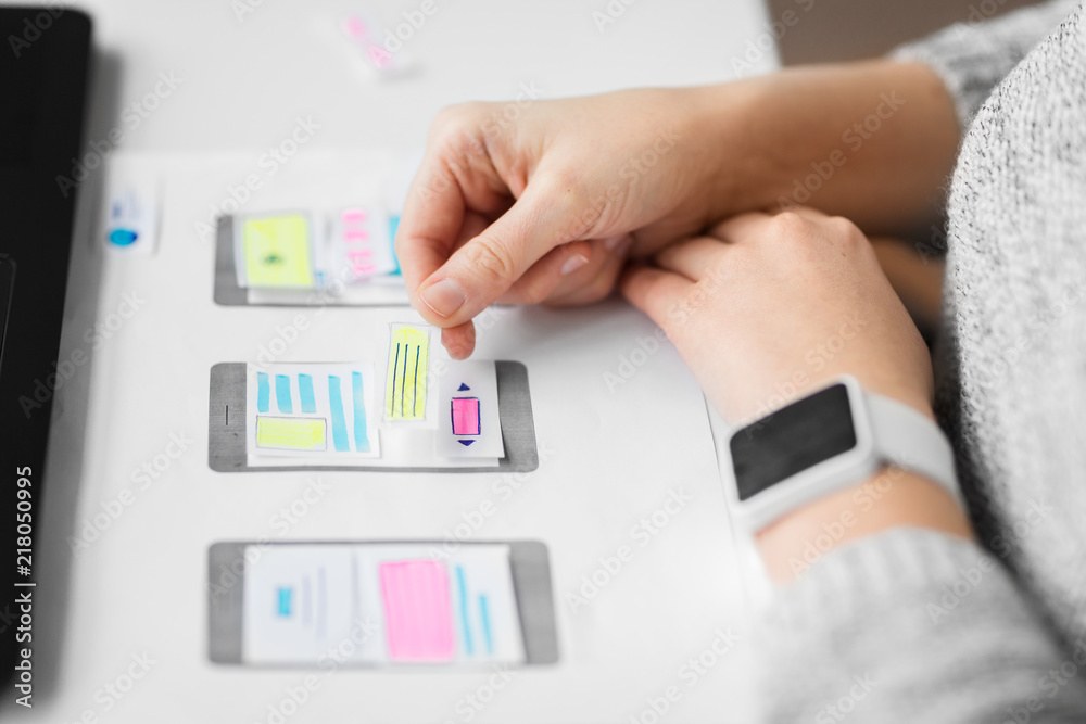 app design, technology and business concept - web designer working on ...