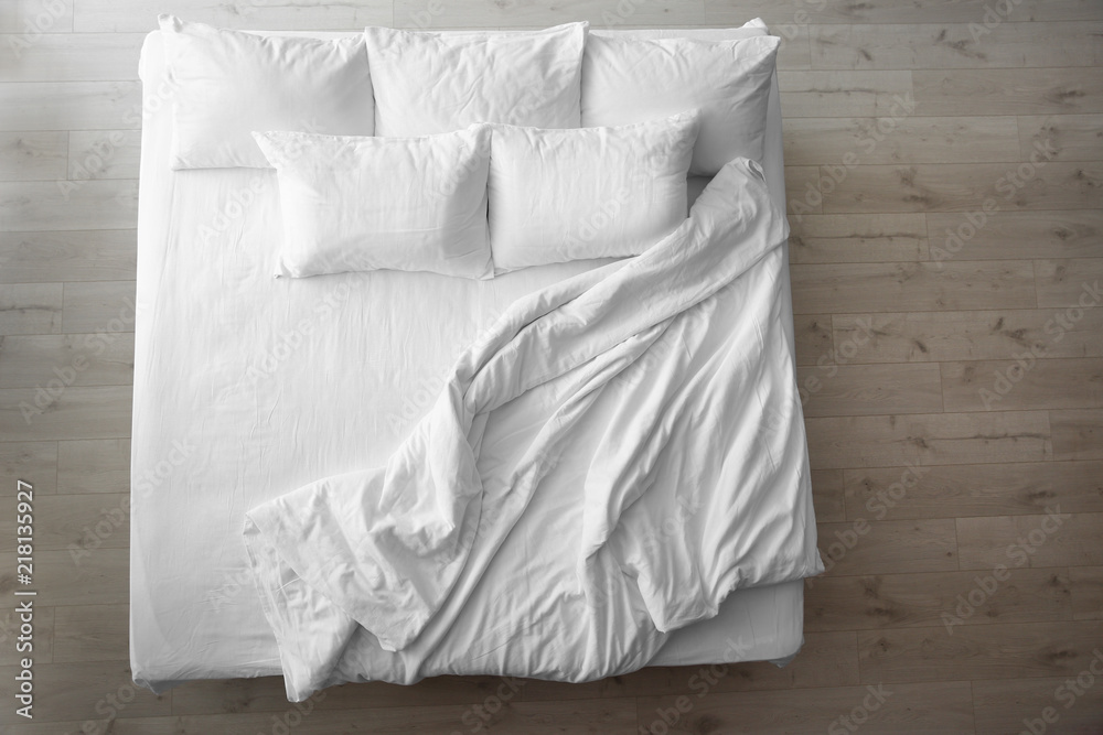 Comfortable bed with soft pillows indoors, top view Stock Photo | Adobe ...