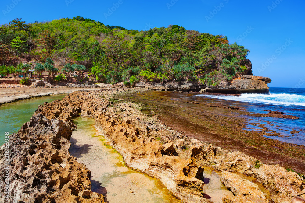 Popular travel destination in East Java - Pantai Batu Bengkung beach ...