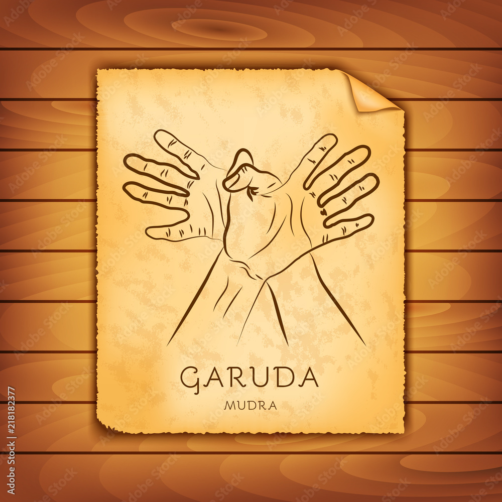 Ancient papyrus with the image of Garuda-mudra on a wooden background ...