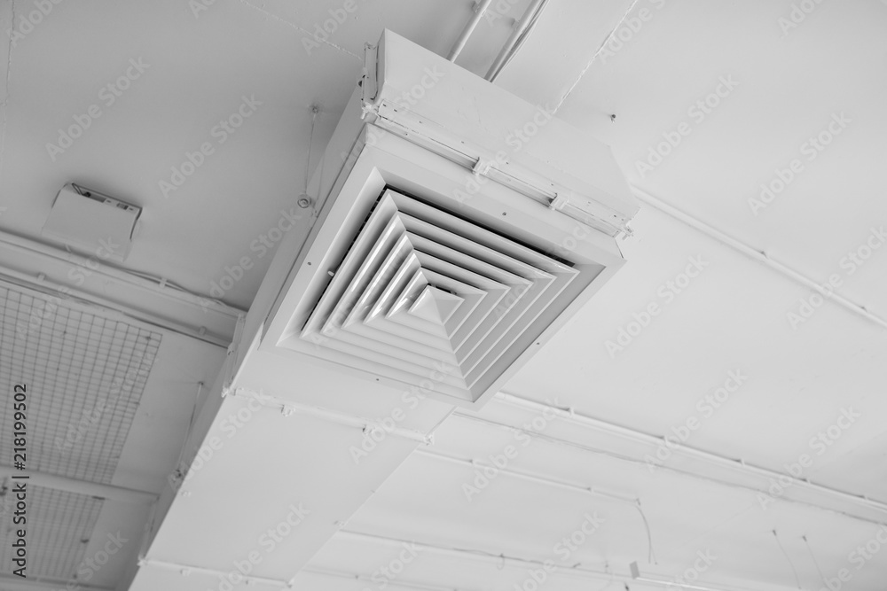 Ventilation system on the ceiling of large buildings. Ventilation pipes ...