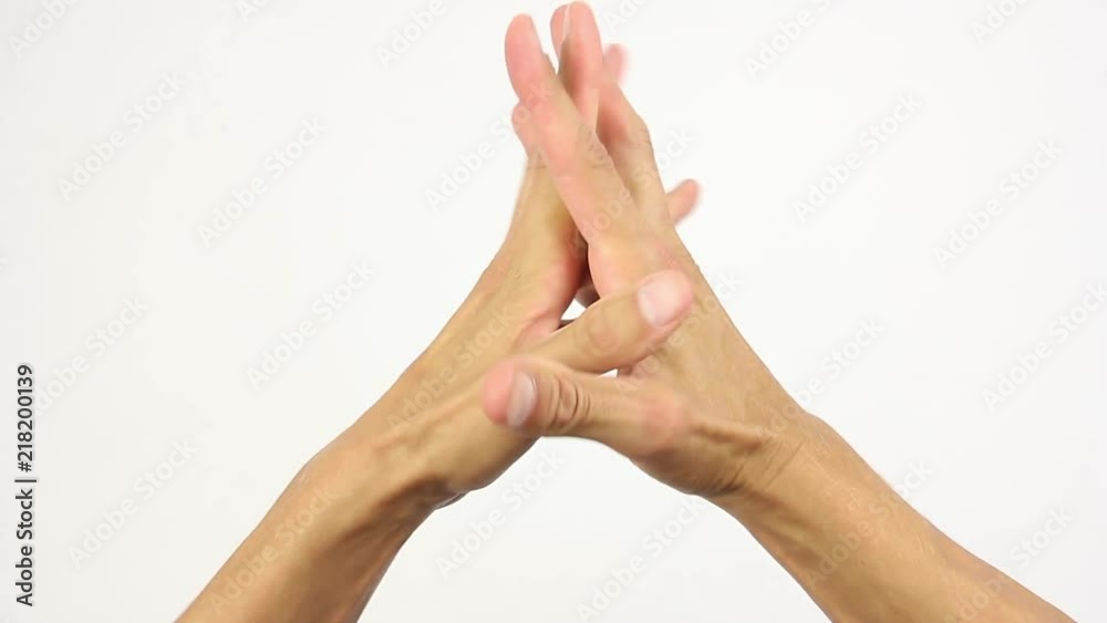 right and left human hands are connected in a lock, then splits and ...