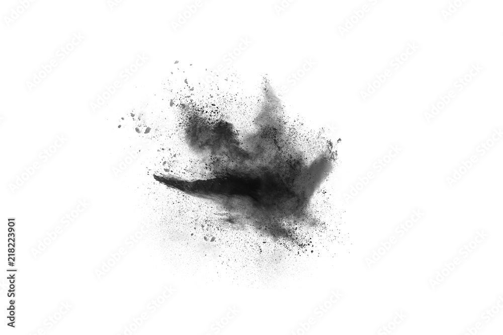 Black powder explosion. Closeup of black dust particles explode ...